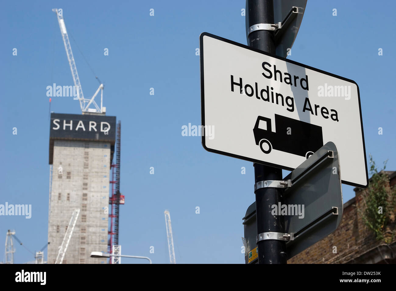 Shard Holding Area sign with The Shard under construction behind it, St ...