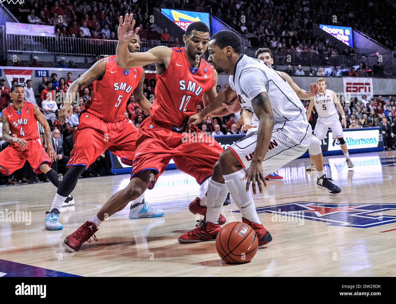 Connecticut Huskies guard Omar Calhoun (21) drives past Southern ...