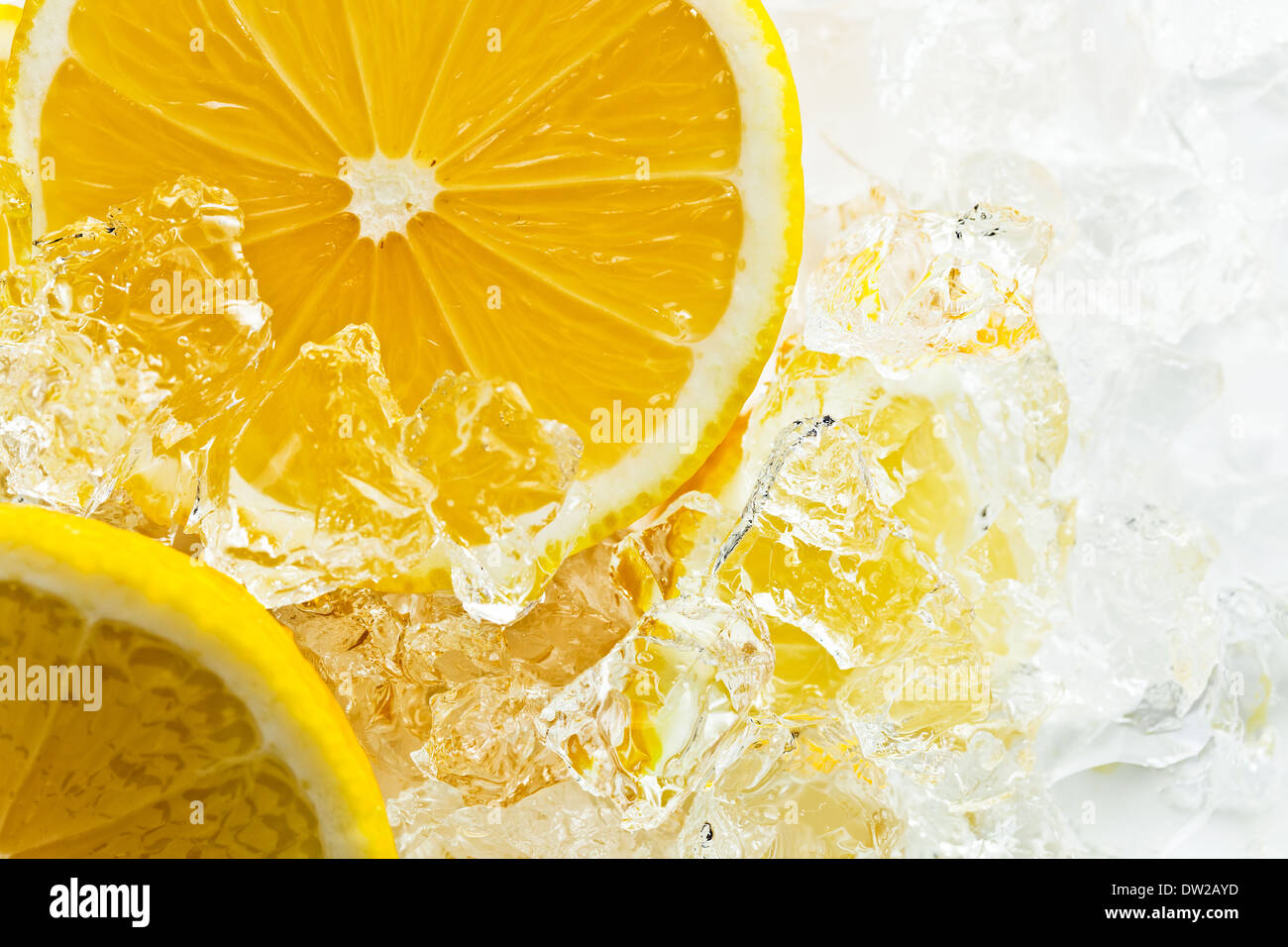 slices of lemon with ice Stock Photo - Alamy