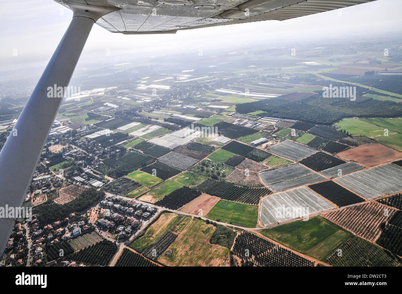 Aerial view of Sharon District, Israel from within a Cessna airplane ...