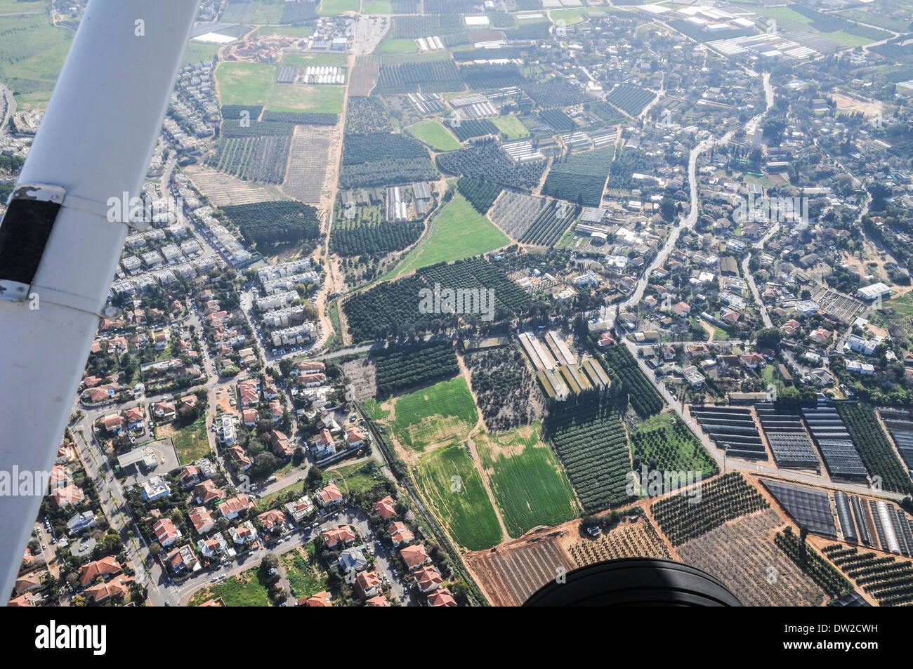Aerial view of Sharon District, Israel from within a Cessna airplane ...