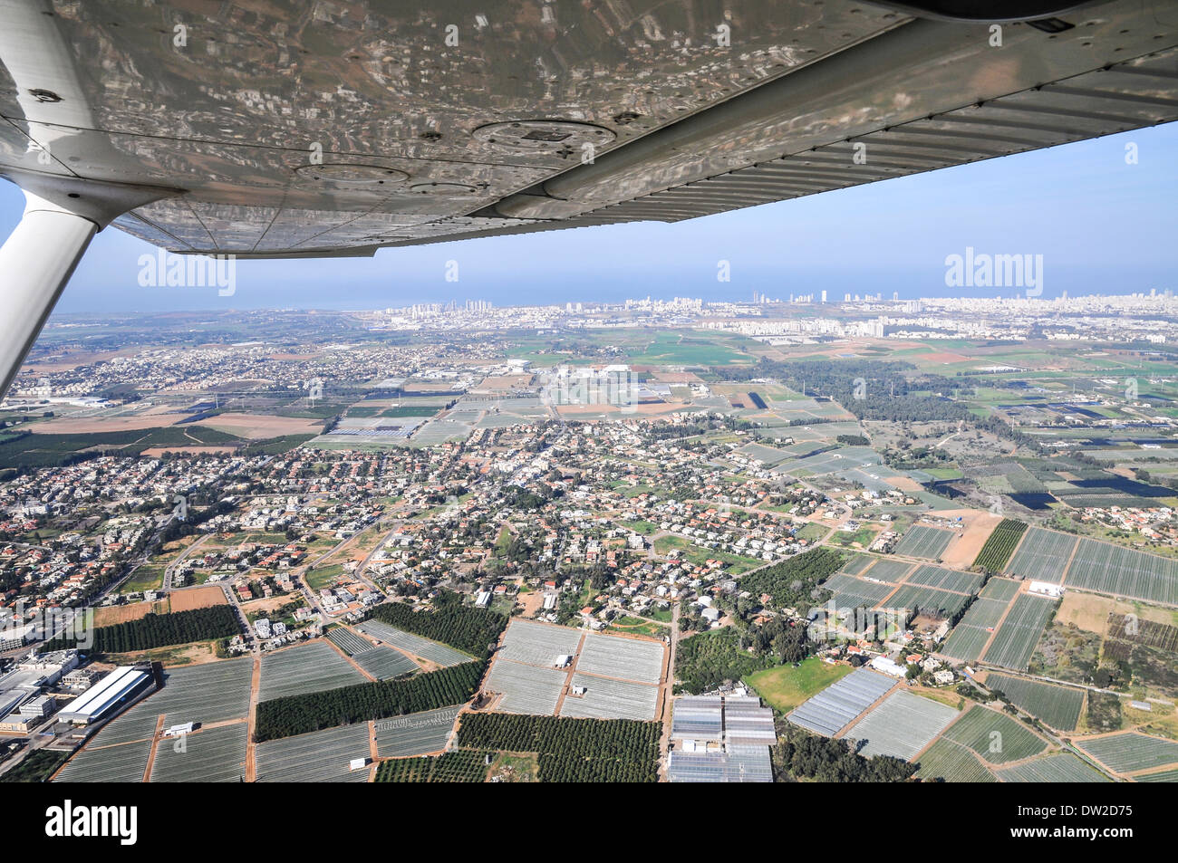 Aerial view of Sharon District, Israel from within a Cessna airplane ...