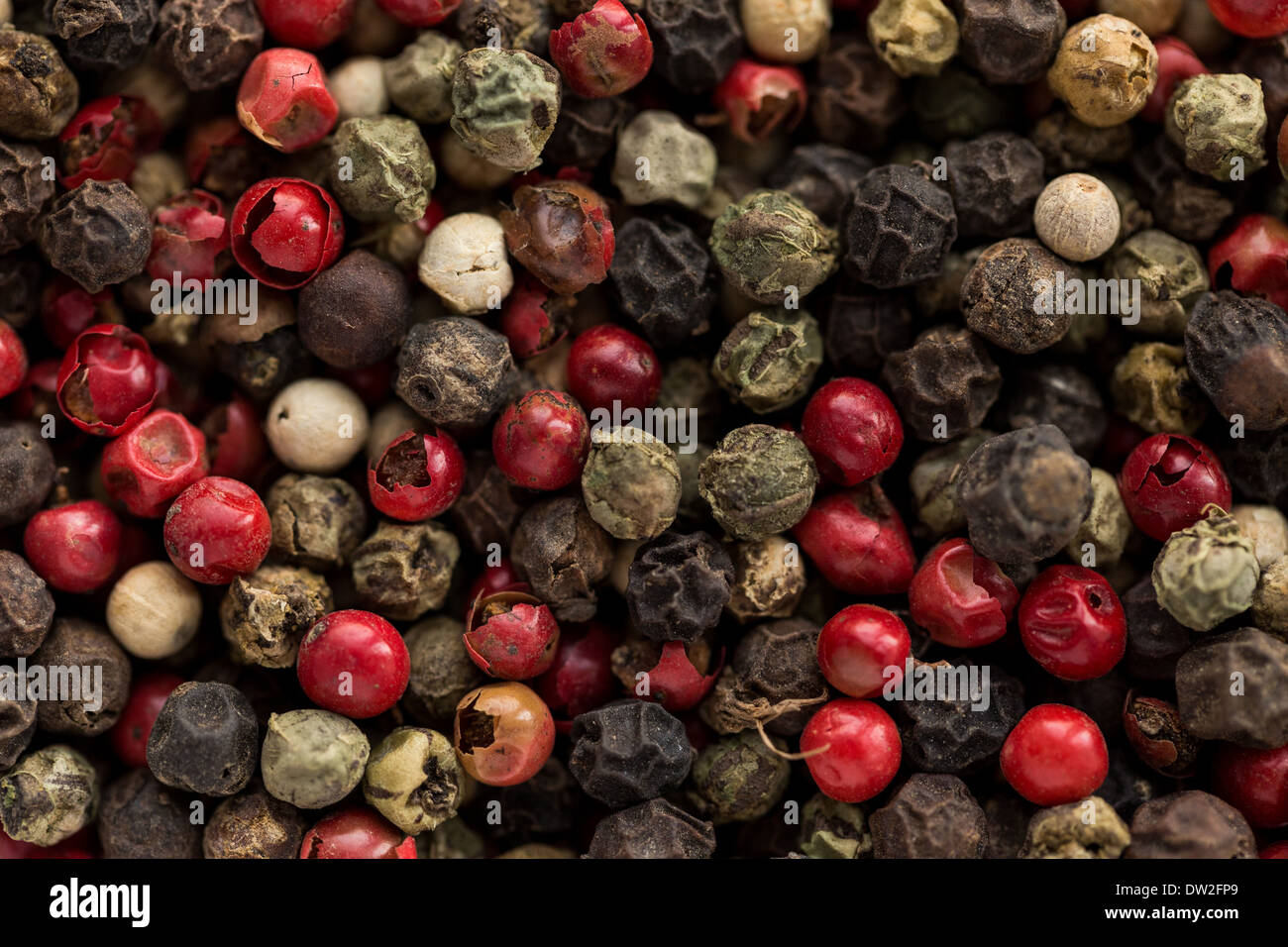 small dry peppercorn any colors in food background Stock Photo - Alamy