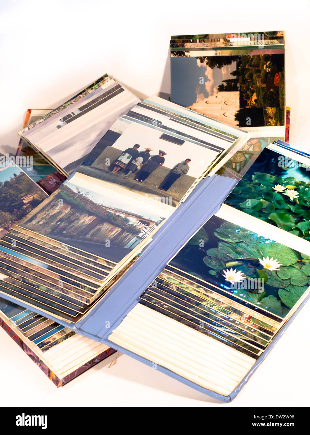 Old photo flip albums with blurry, faded and discoloured holiday and ...