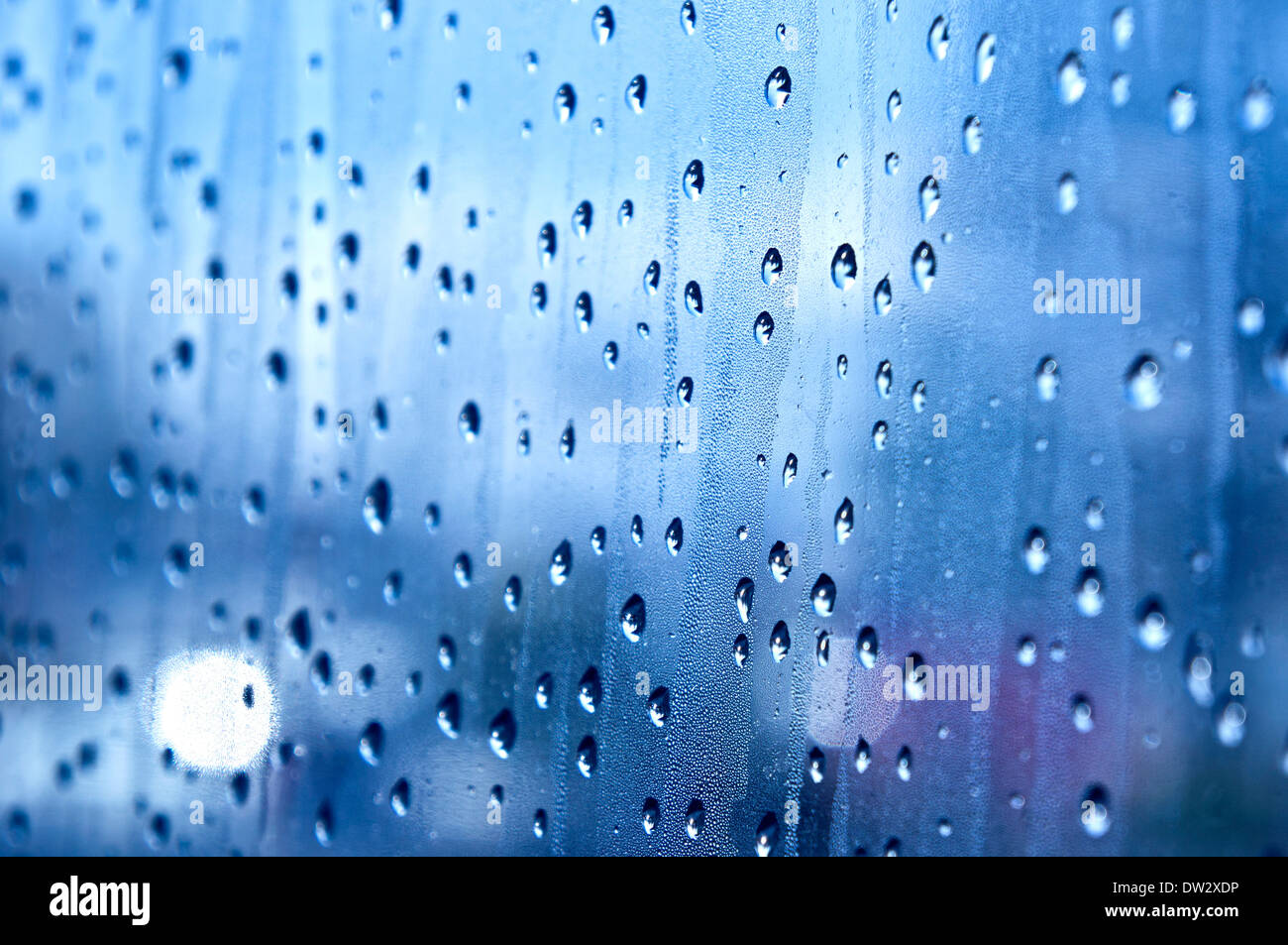 Raindrops on glass Stock Photo - Alamy