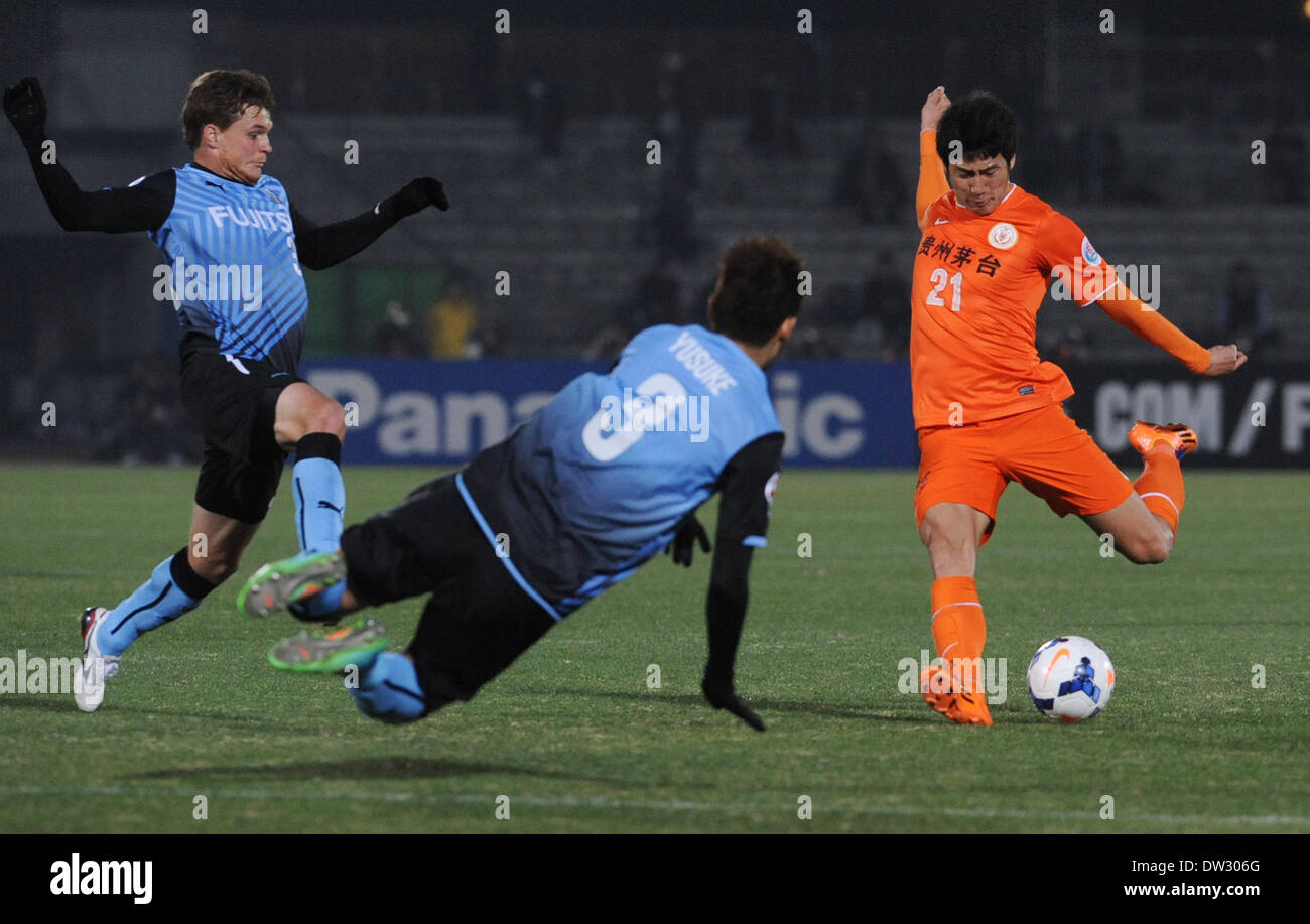 Kawasaki, Japan. 26th Feb, 2014. Yu Hai (R) of China's Guizhou Renhe FC ...