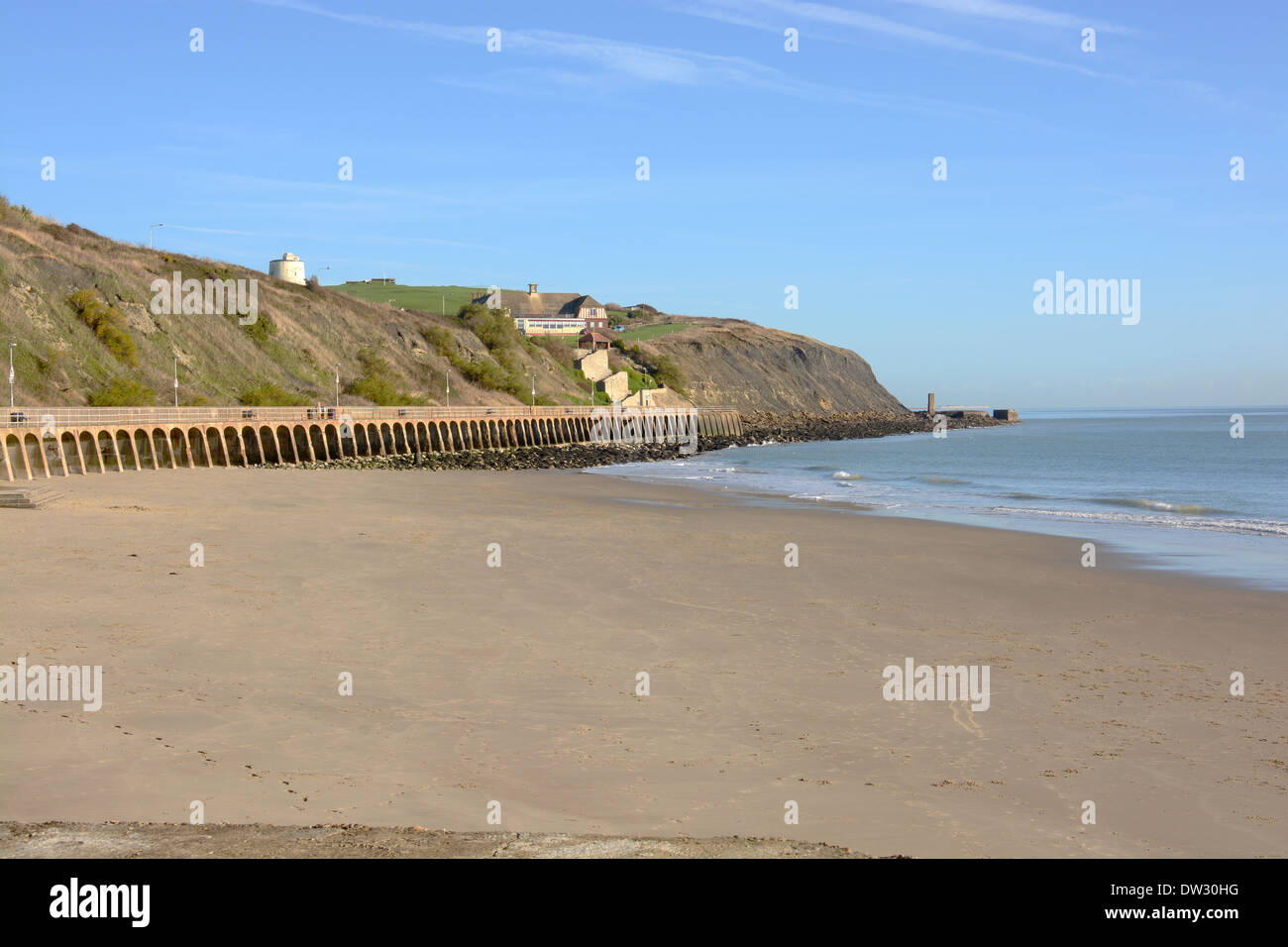 Sandy beach by the harbour at Folkestone in Kent. England Stock Photo ...