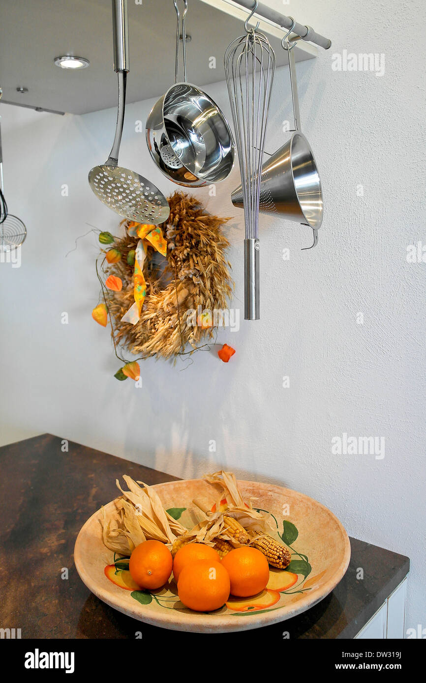 Kitchen utensils hanging in kitchen hi-res stock photography and images ...