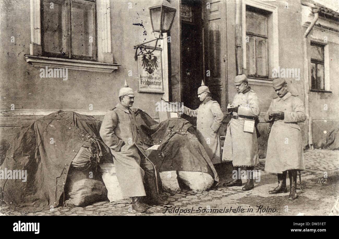 German soldiers write field post cards in a field post office in Kolno ...