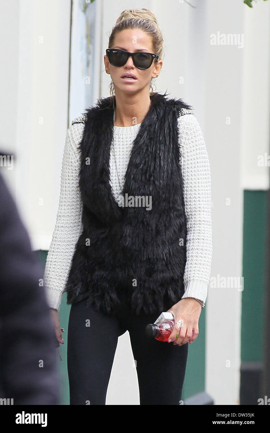 Sarah Harding caught in rain storm near her home in Primrose Hill ...