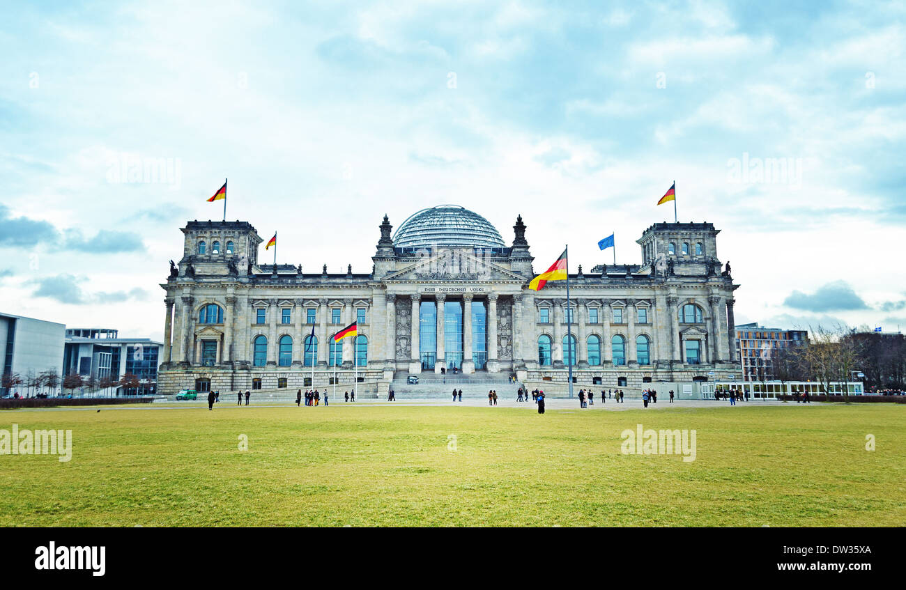 Image of the Reichstag in Berlin, Germany. Tourists and pedestrians are ...