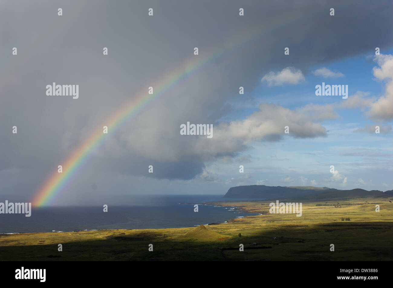 Rainbow sweeping in from the sea, seen from Rana Raraku, Rapa Nui ...