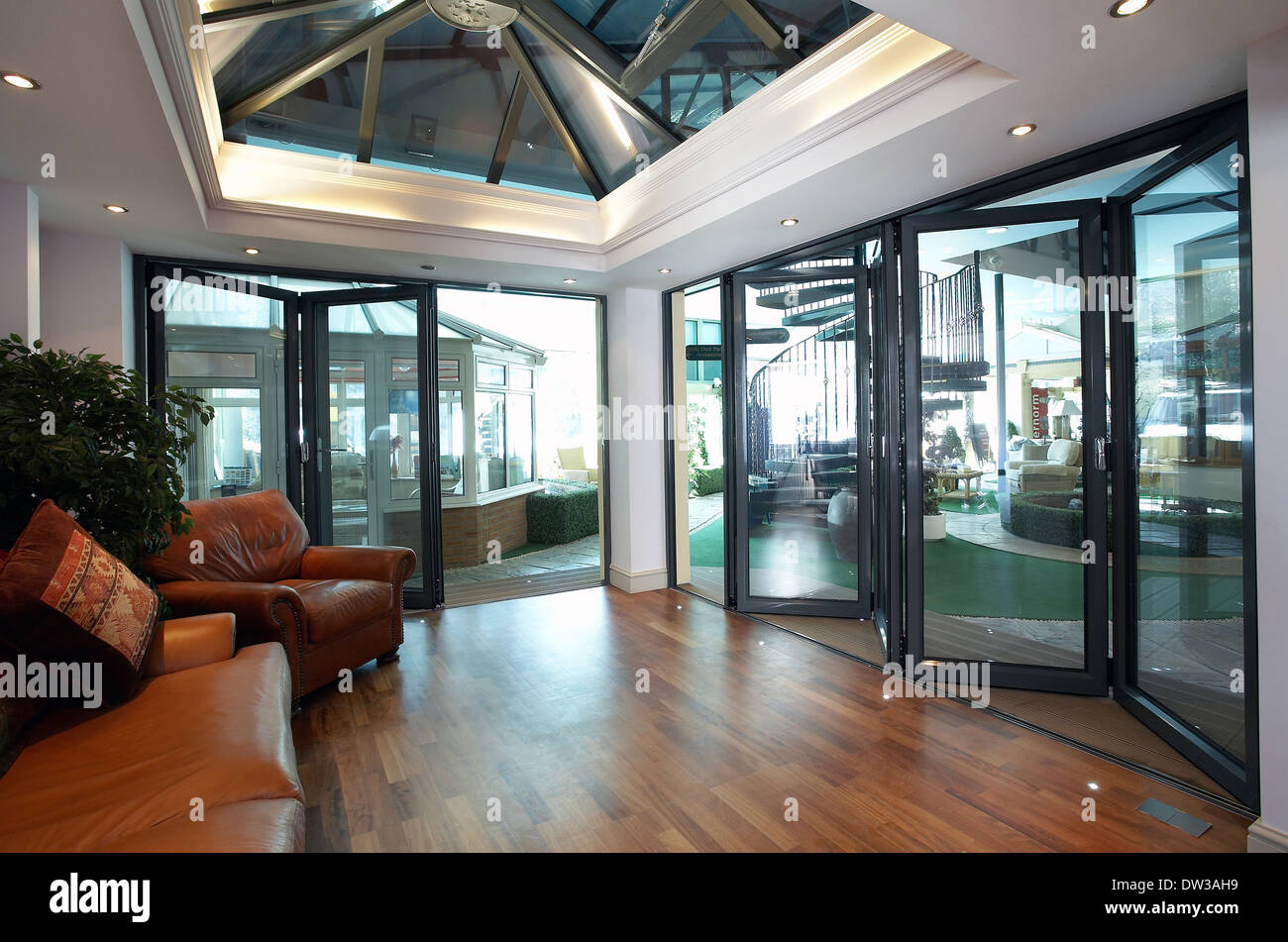 Inside an orangery type conservatory with a glass skylight window and ...