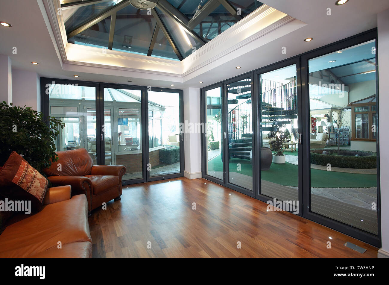 Inside an orangery type conservatory with a glass skylight window in a ...