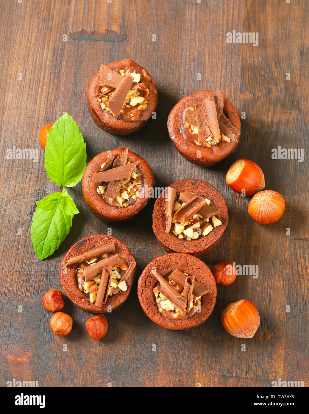 Mini chocolate cakes with hazelnut filling Stock Photo - Alamy