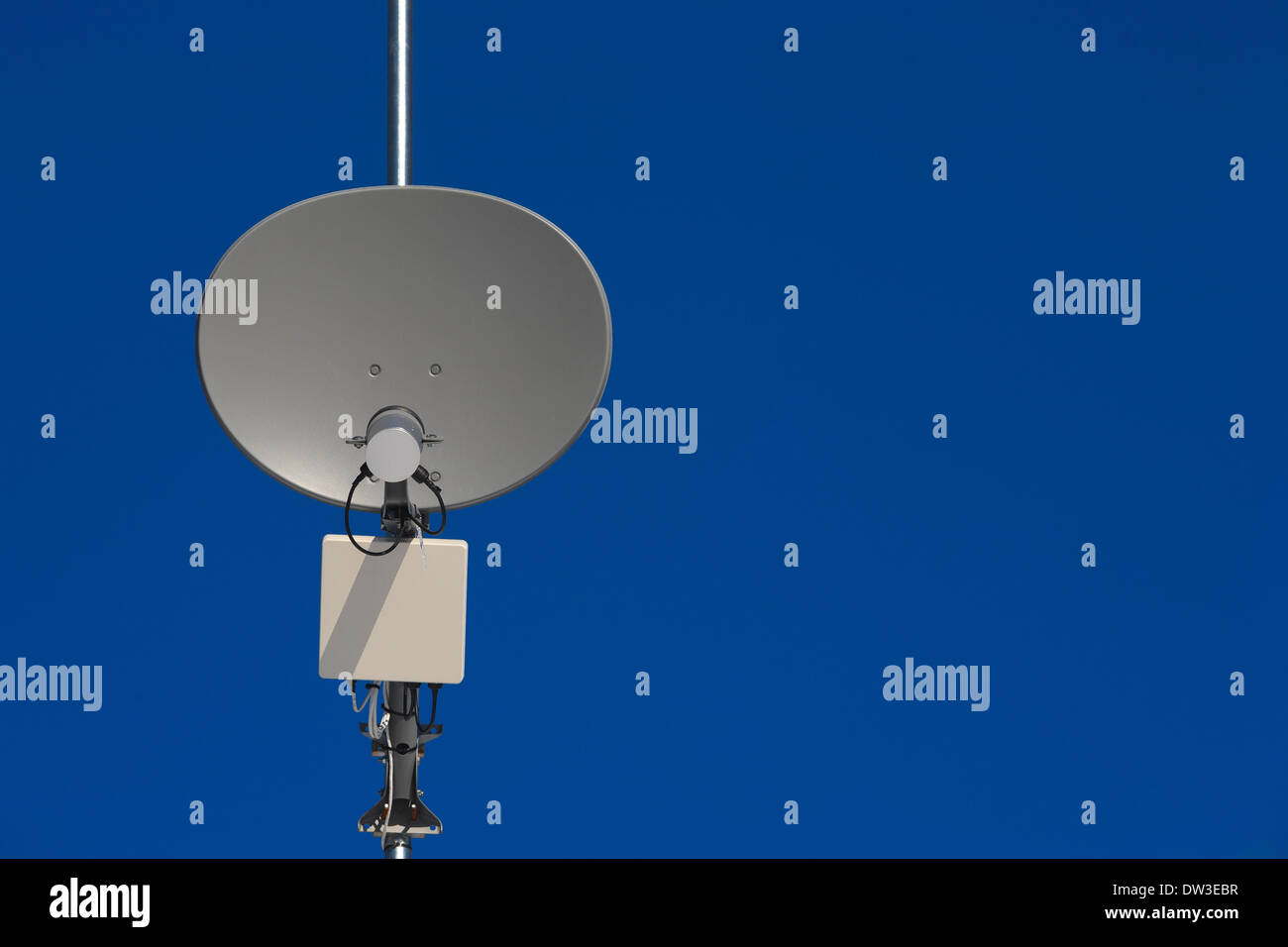 Satellite dish and blue sky Stock Photo - Alamy