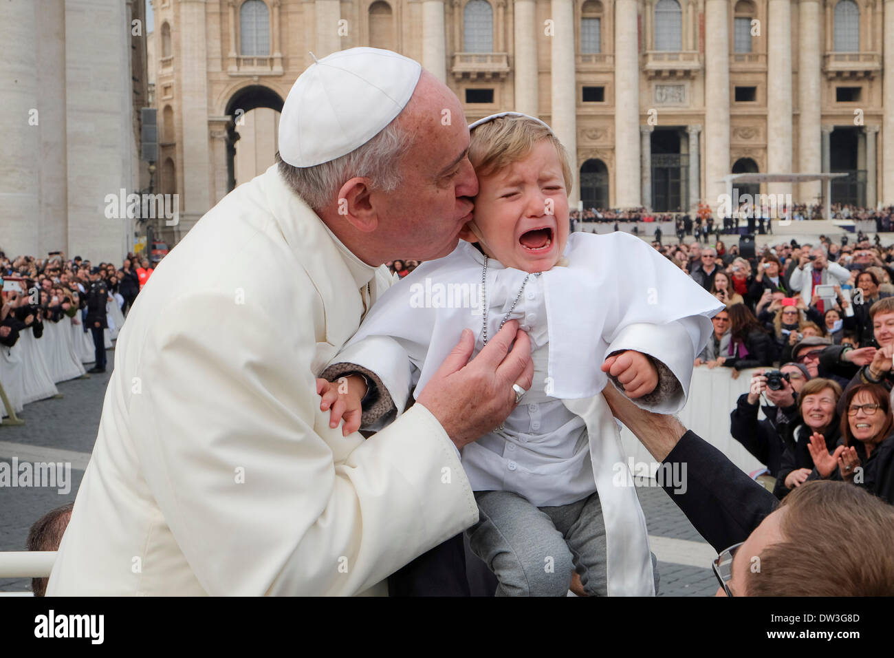 Vatican, Rome, Italy. 26th February 2014. Pope Francis kiss a kid ...