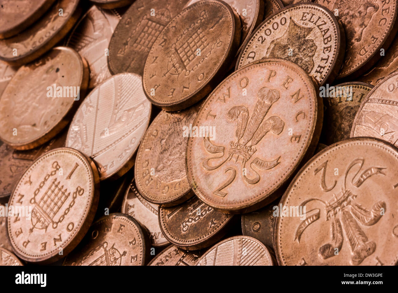 British one penny and two penny copper coins. An extreme close-up of ...