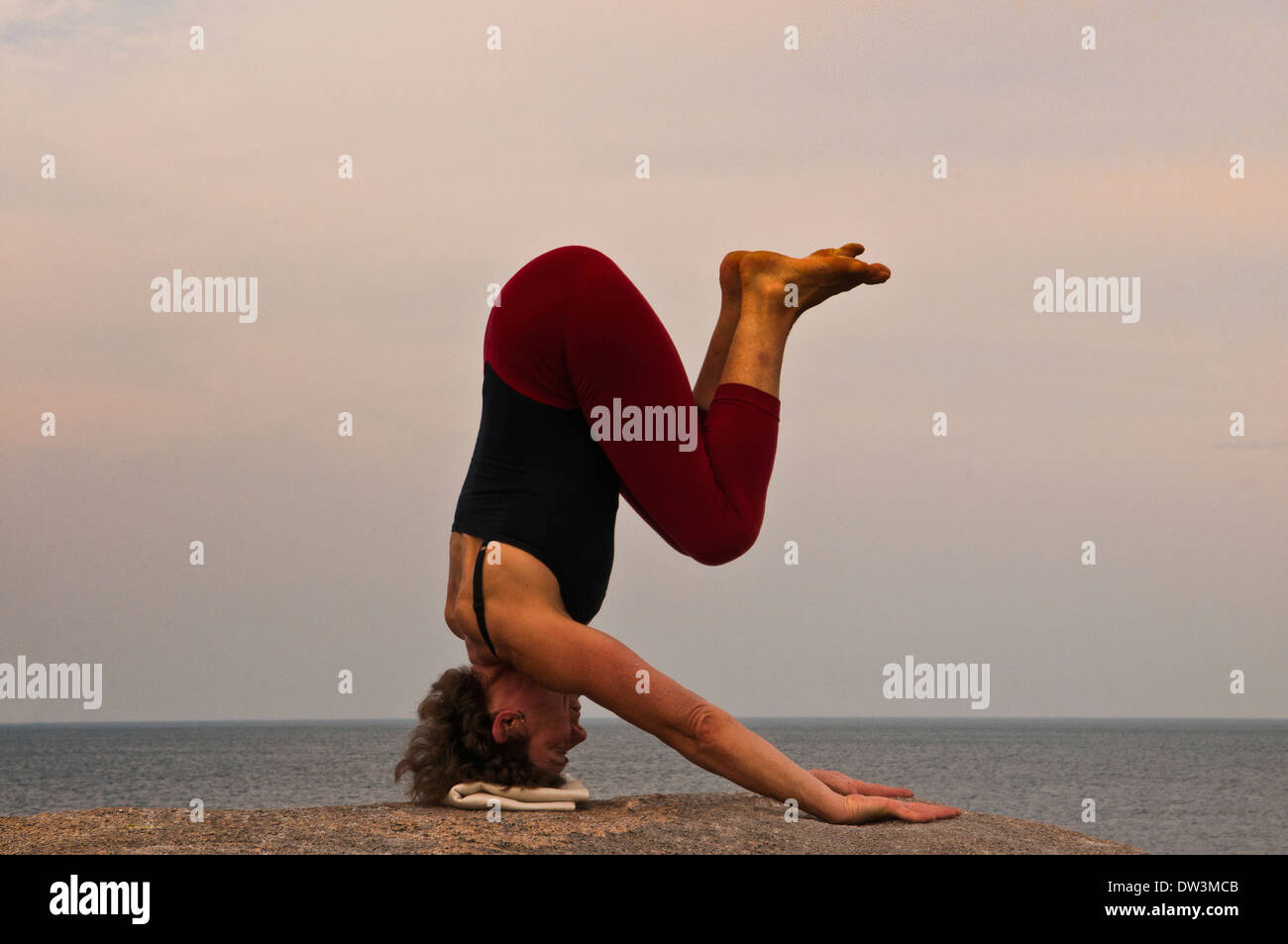 Mukta hasta sirsasana hi-res stock photography and images - Alamy