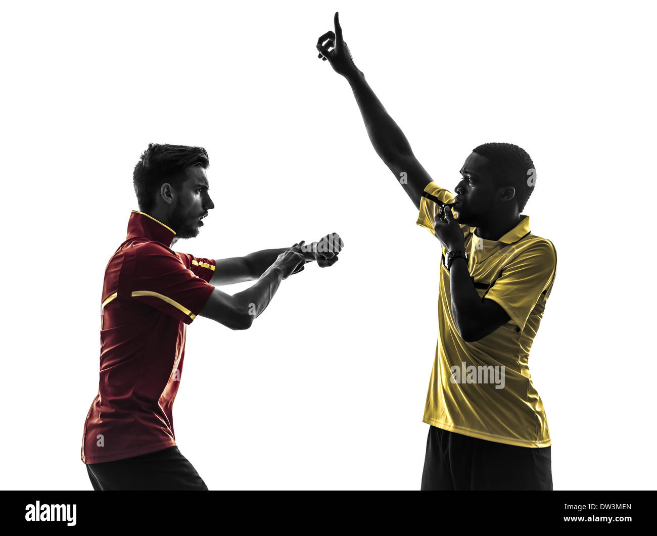 two men soccer player and referee blowing whistle in silhouette on ...