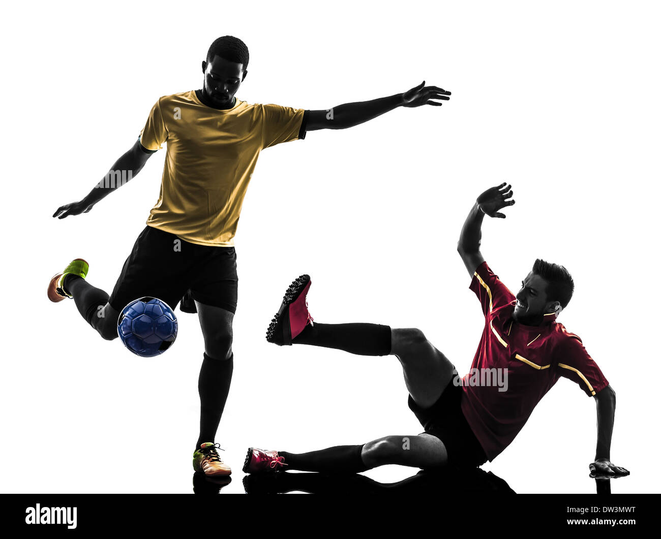 two men soccer player playing football competition in silhouette on ...