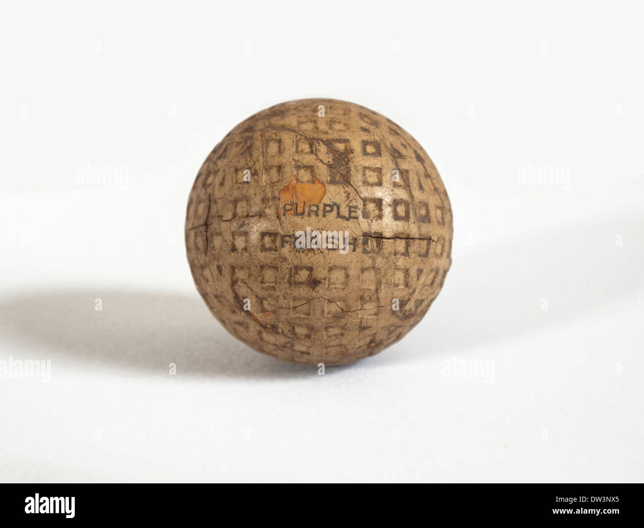 early 1900s golf ball with square dimples Stock Photo - Alamy