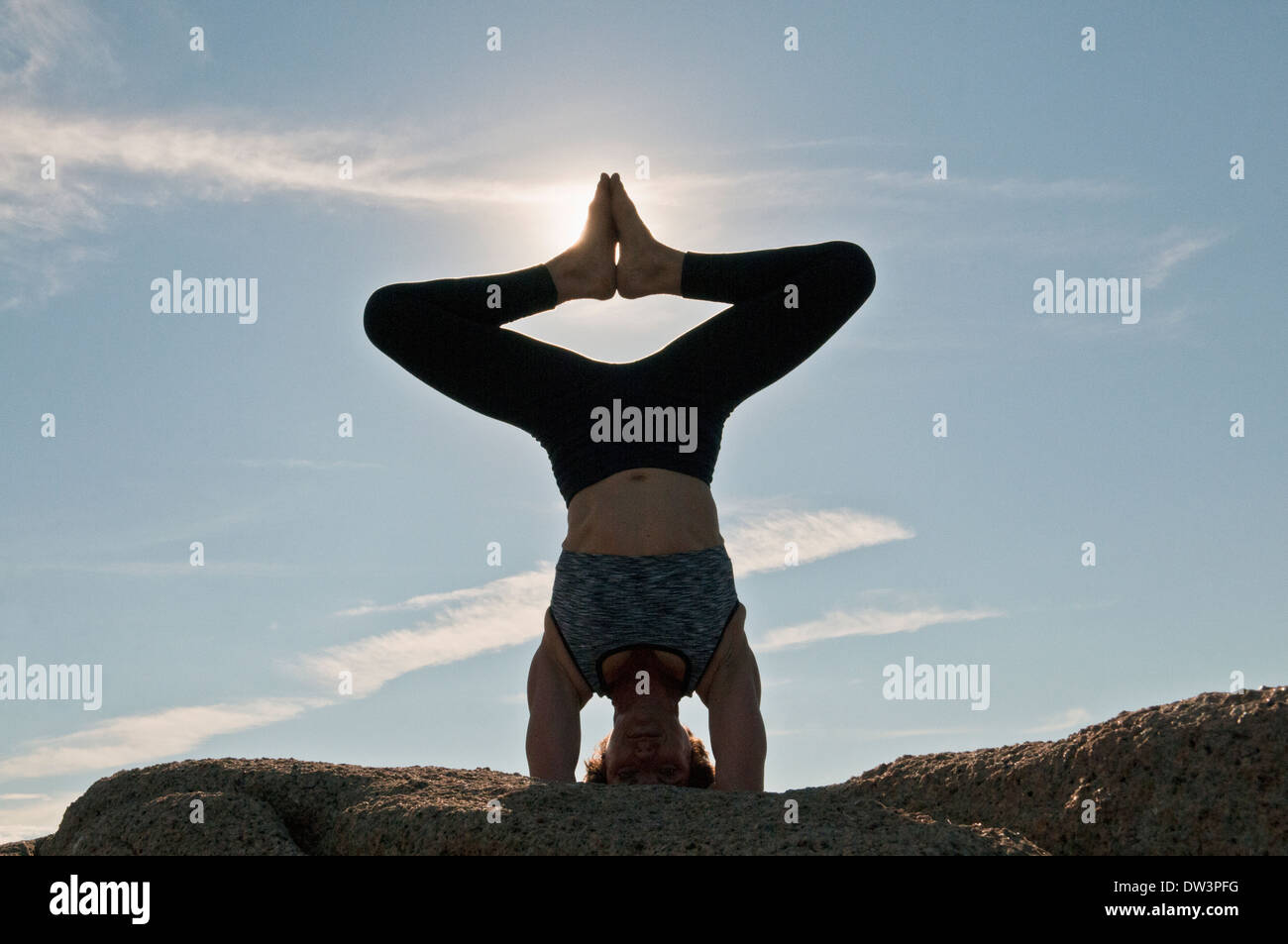 Iyengar Yoga Instructor Demonstrates Sirsasana Baddha Konasana in ...