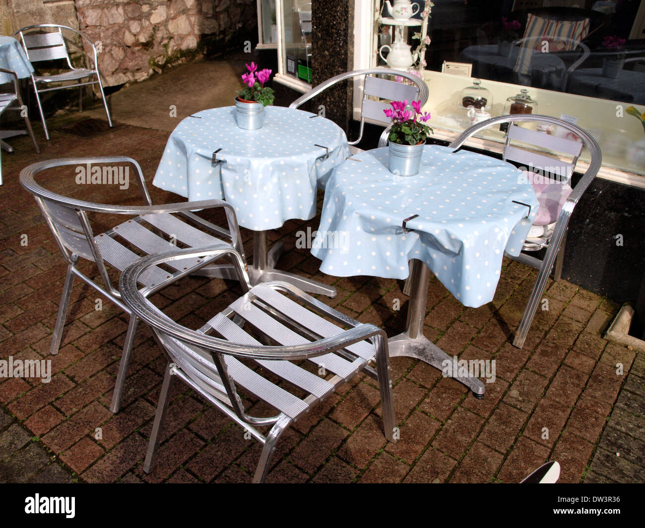 Tables and chairs outside café, Sidmouth, Devon, UK Stock Photo - Alamy