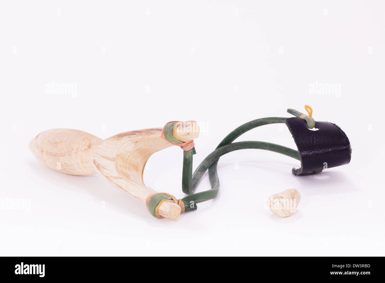 Sling Shot with a rock Stock Photo - Alamy