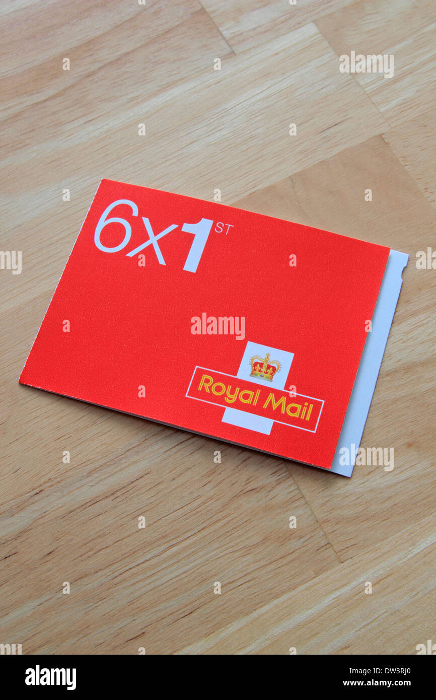 Royal mail first class stamp book hi-res stock photography and images ...