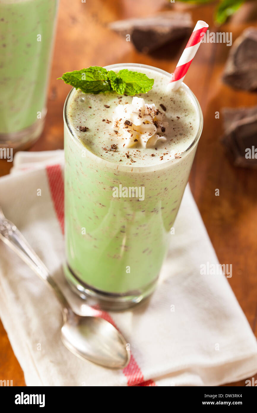 Cold Refreshing Mint Chocolate Chip MilkShake with a Straw Stock Photo ...