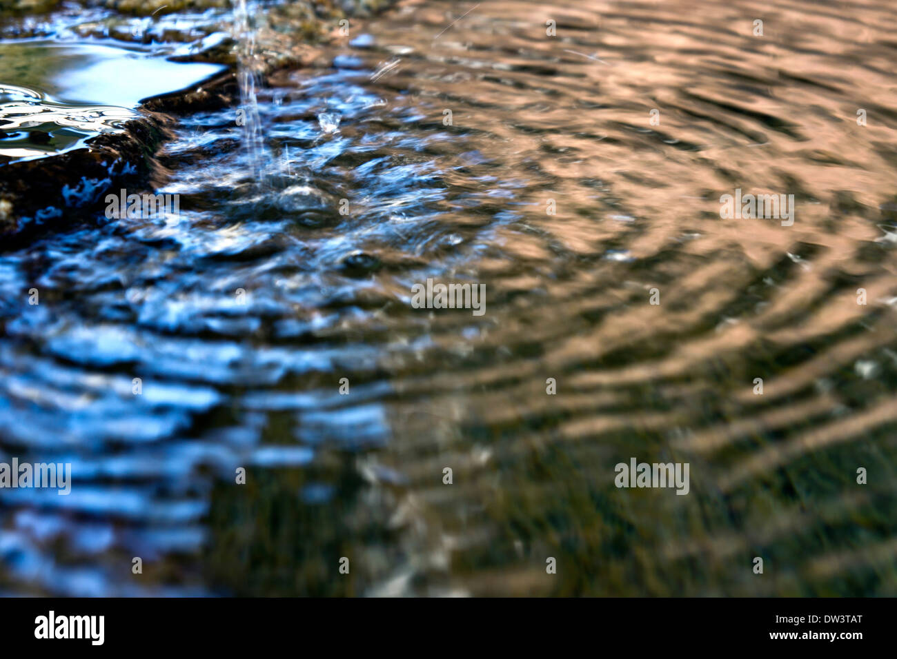 Spreading ripples hi-res stock photography and images - Alamy