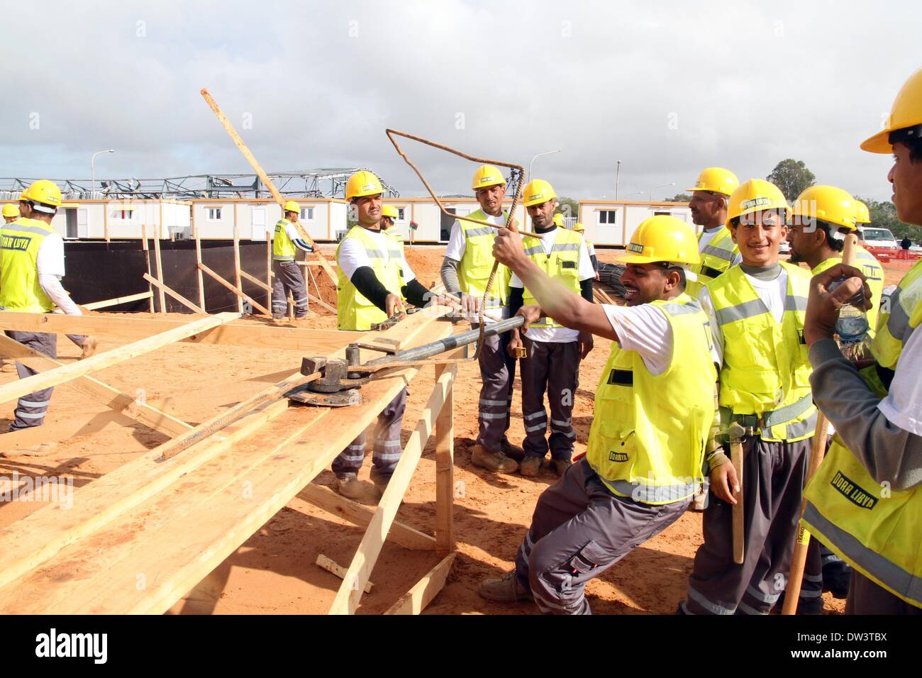 Tripoli, Libya. 26th Feb, 2014. Workers work at the construction site ...