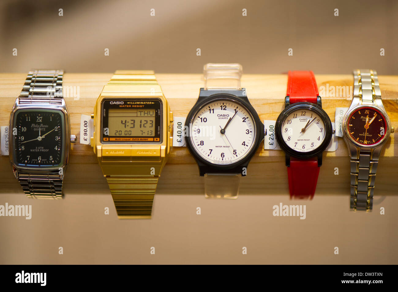 Selection of watches on sale in a shop Stock Photo - Alamy