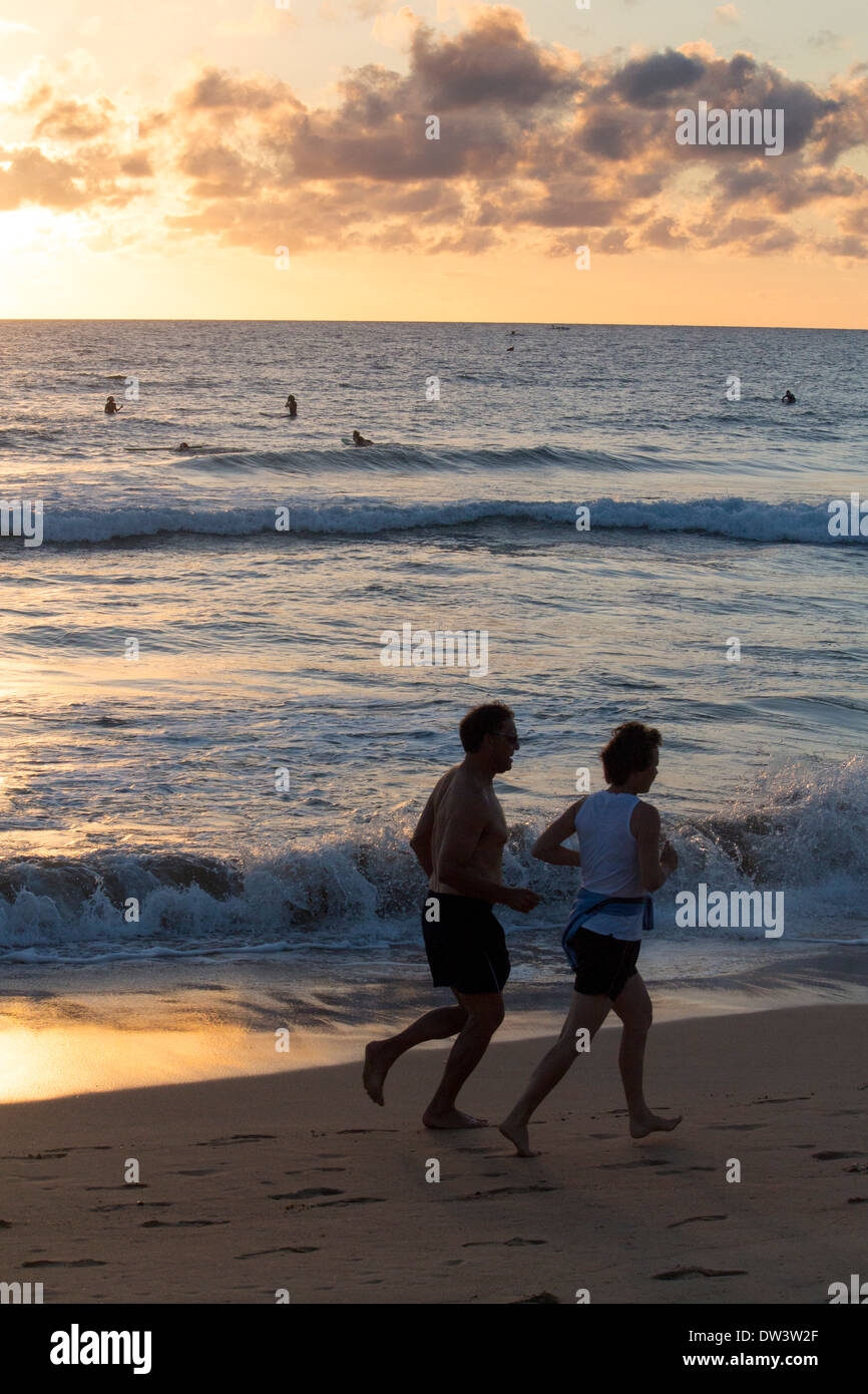 Manly North Steyne Beach at dawn sunrise with middle aged 50s couple ...