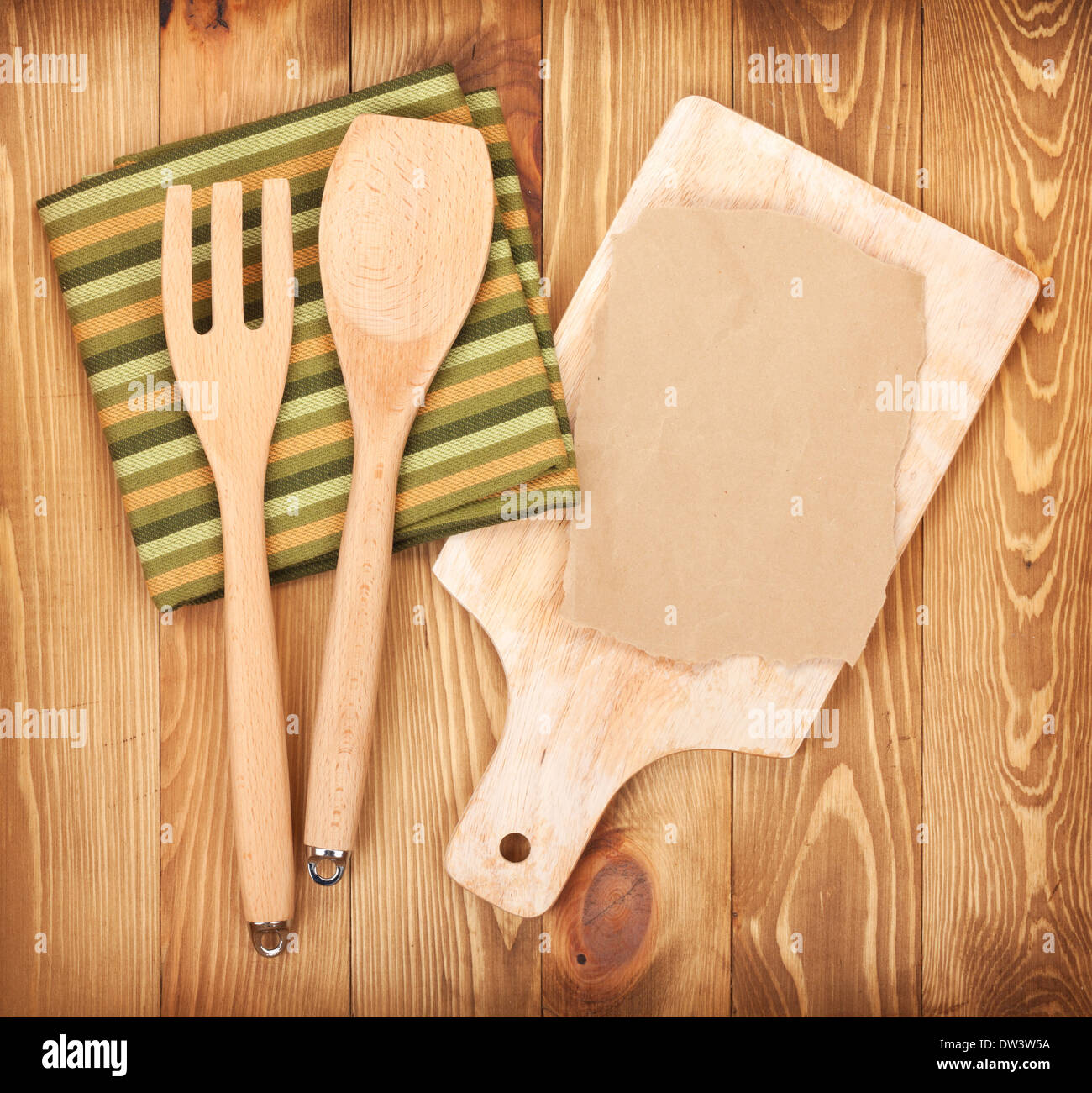 Kitchen utensils on wooden table background. View from above with copy ...