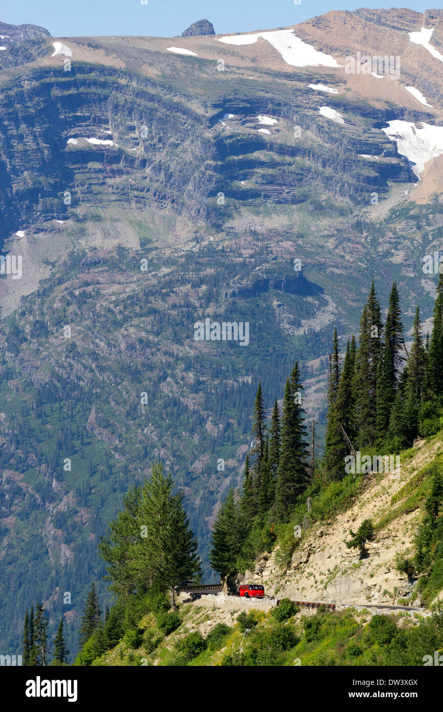 Red Jammer bus on the Going-to-the-Sun Road in Glacier National Park ...