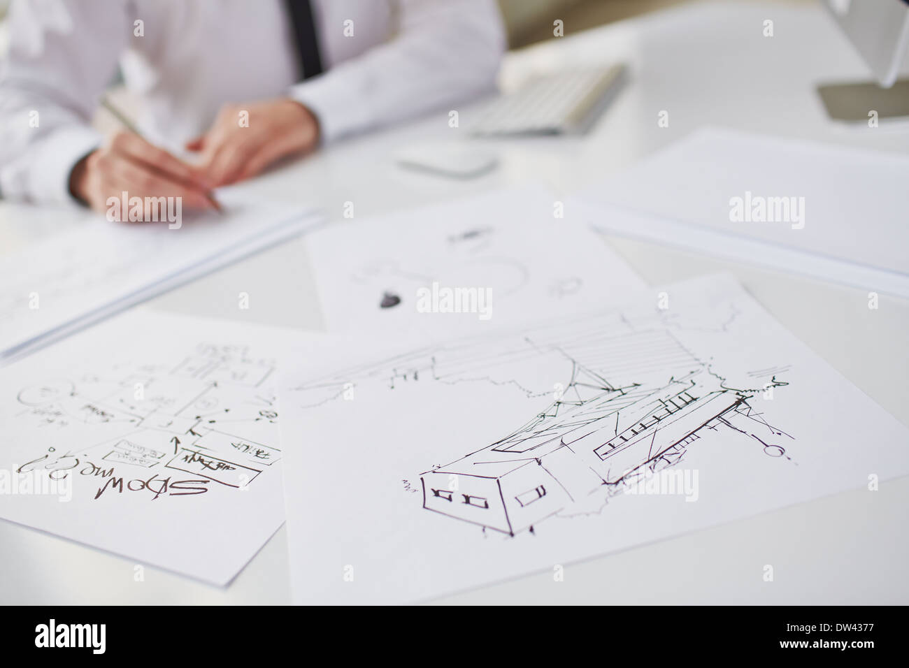 Image of sketches at workplace Stock Photo - Alamy