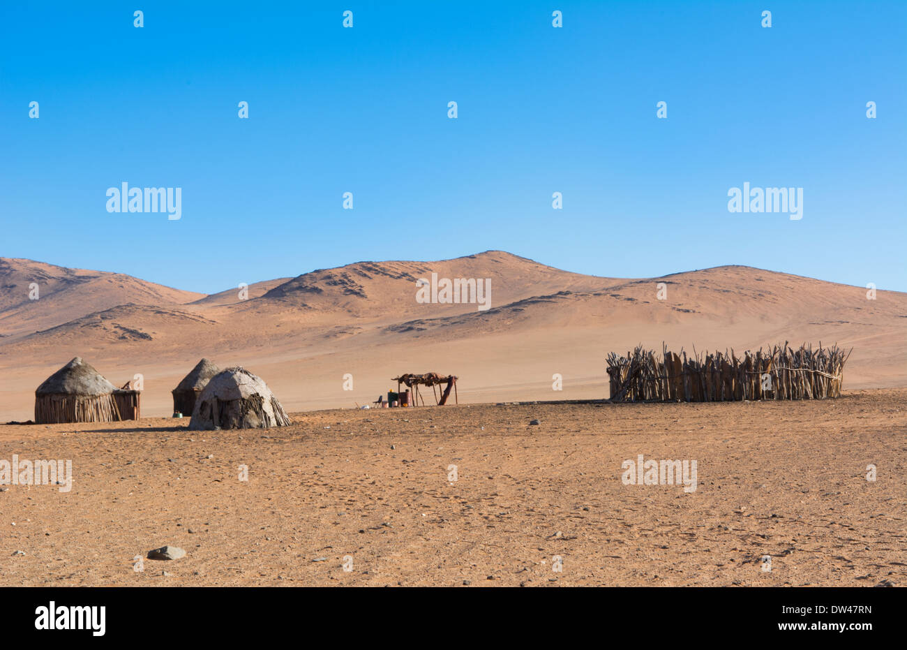 Namibia Africa remote nomadic Himba tribe settlement of hut homes in ...