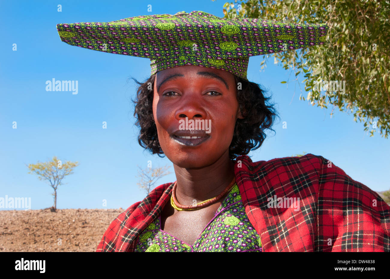 Namibia Africa Northern Desert colorful Herero tribe woman in plaid ...