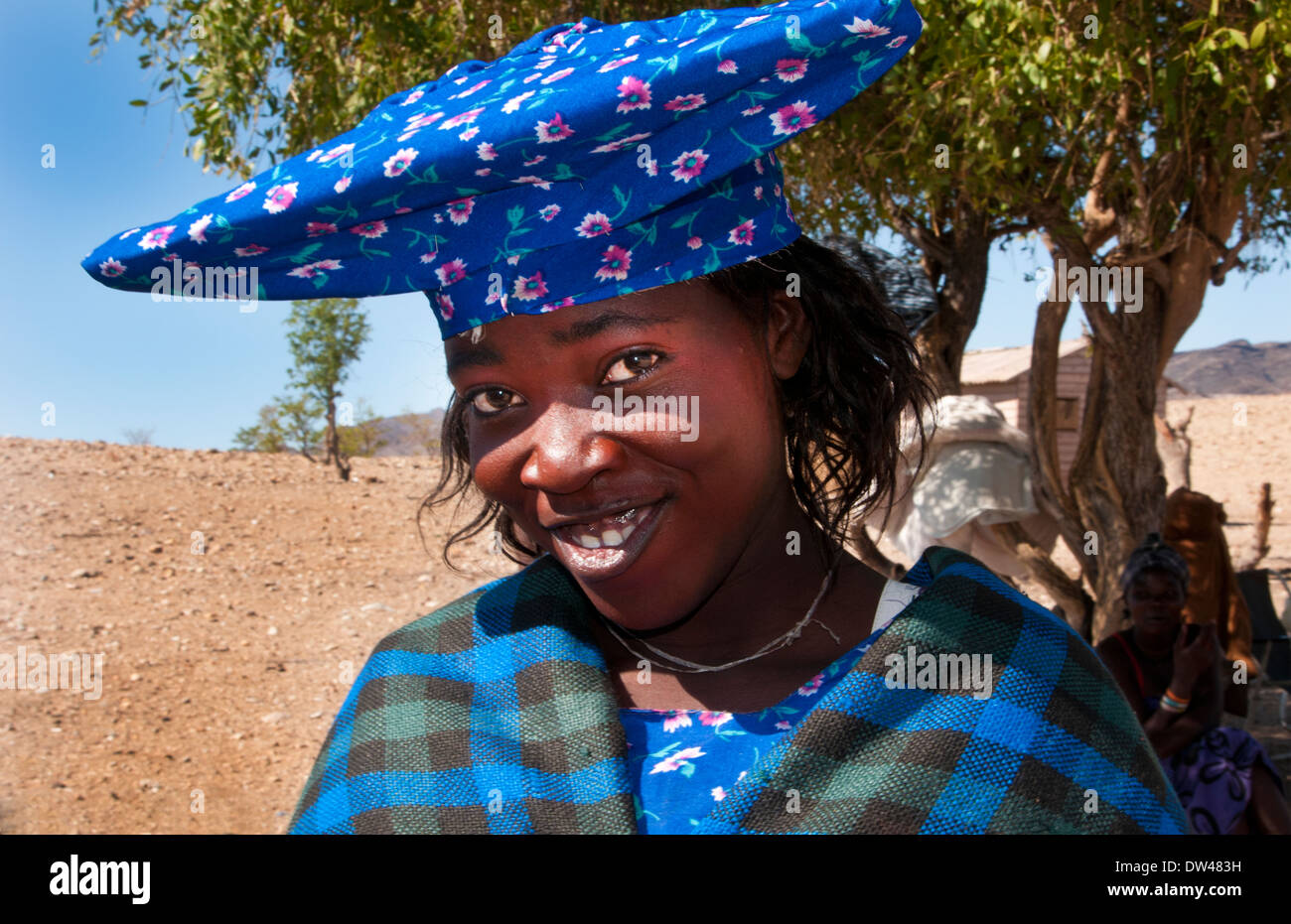 Namibia Africa Northern Desert colorful Herero tribe woman in plaid ...