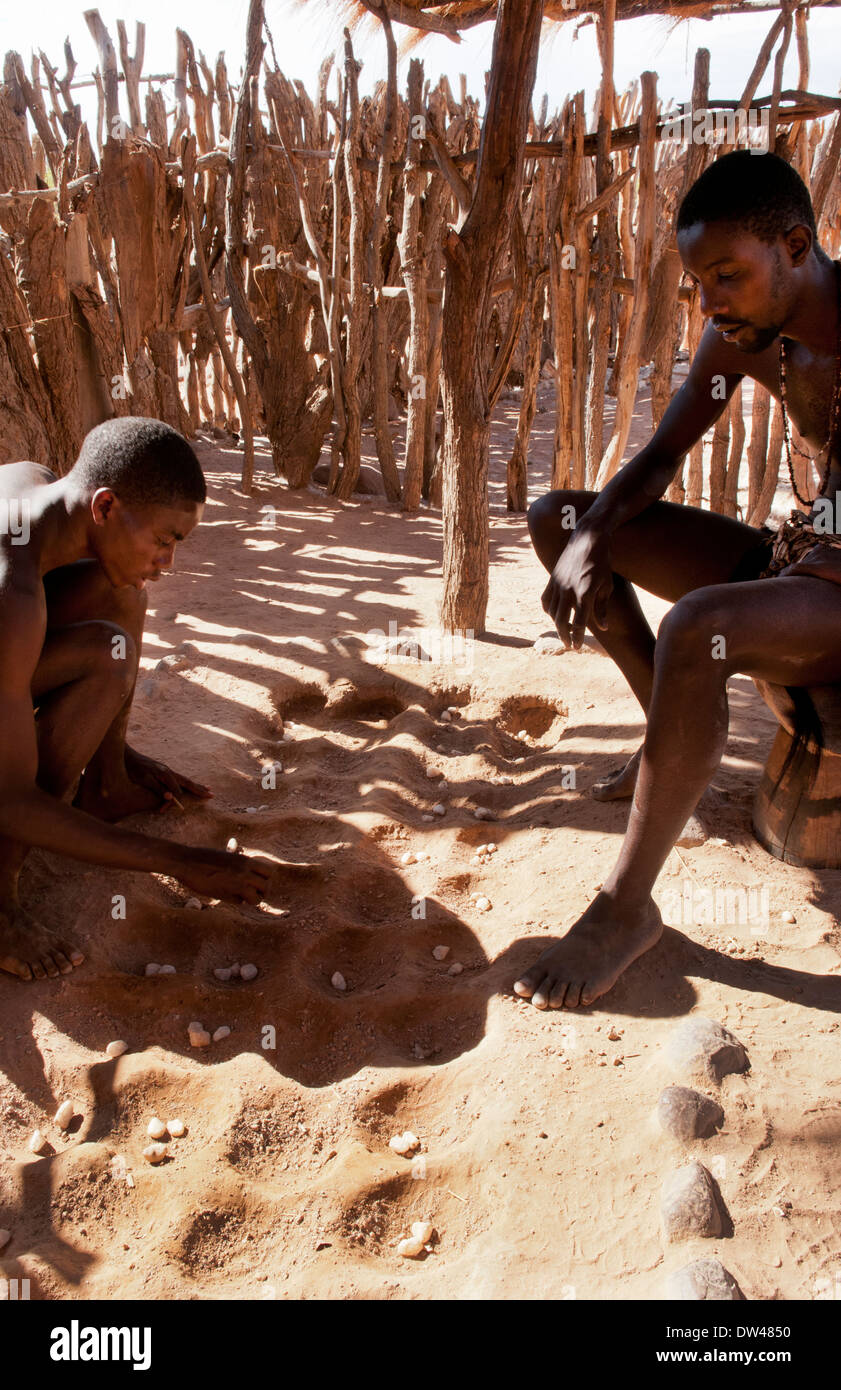 Namibia Africa remote Damara Tribe in Damaraland boys playing ...