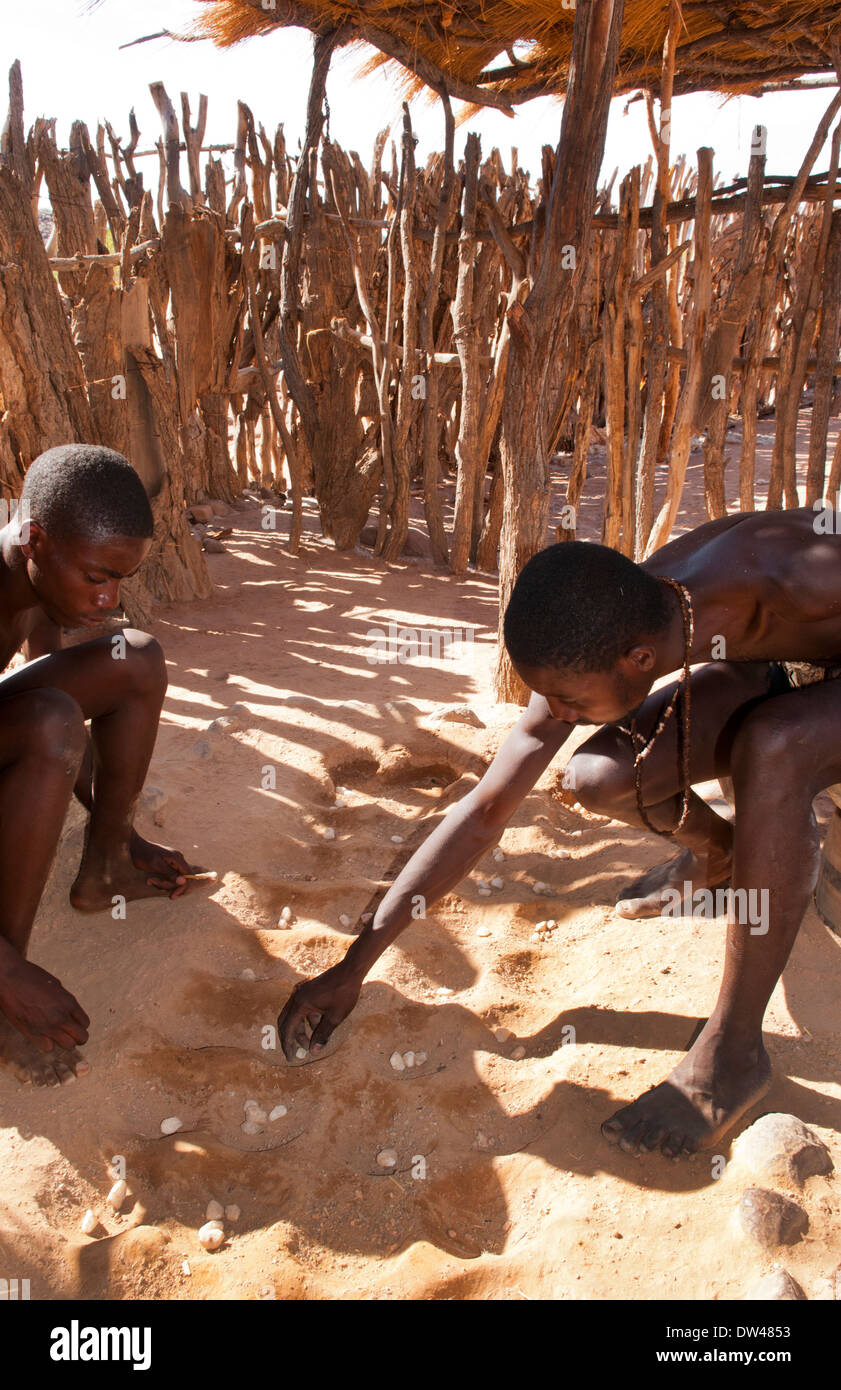 Namibia Africa remote Damara Tribe in Damaraland boys playing ...