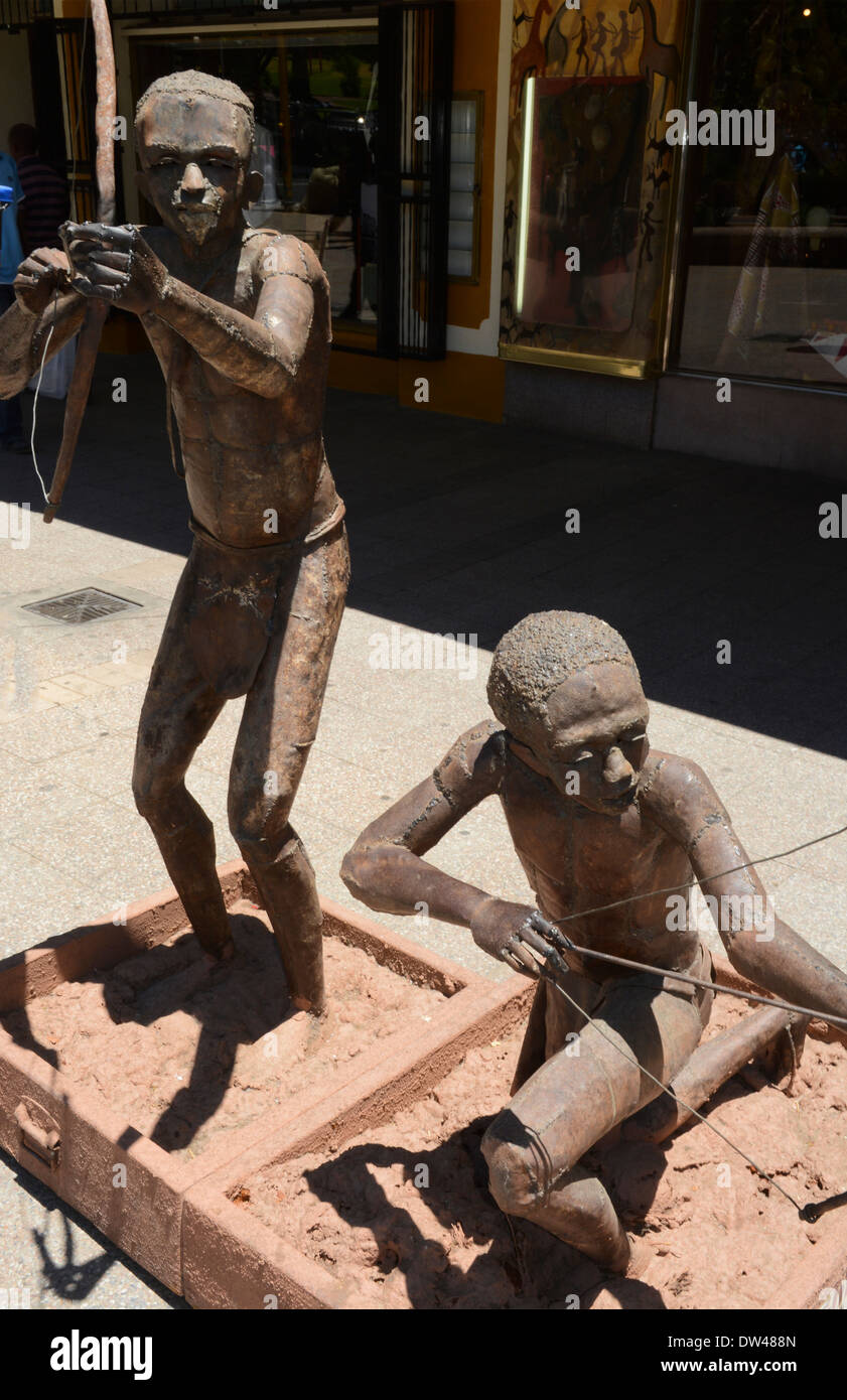 Namibia Africa Windhoek Statue of Bush People by shops on Independence ...