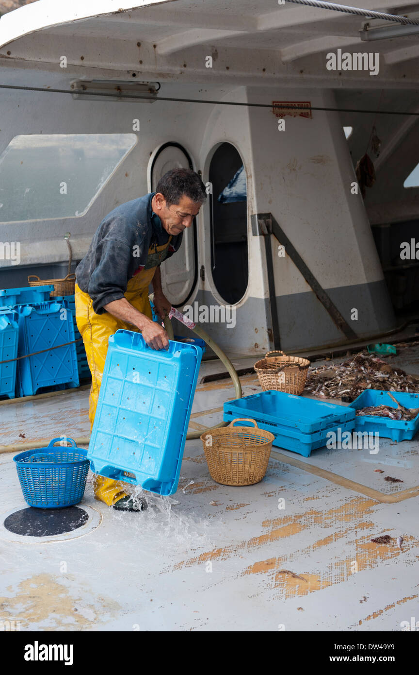 Trawler unloading fish hi-res stock photography and images - Alamy