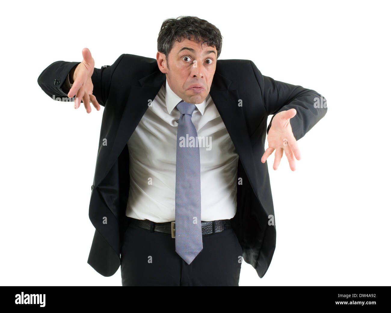 Expressive businessman shrugging his shoulders in ignorance or ...
