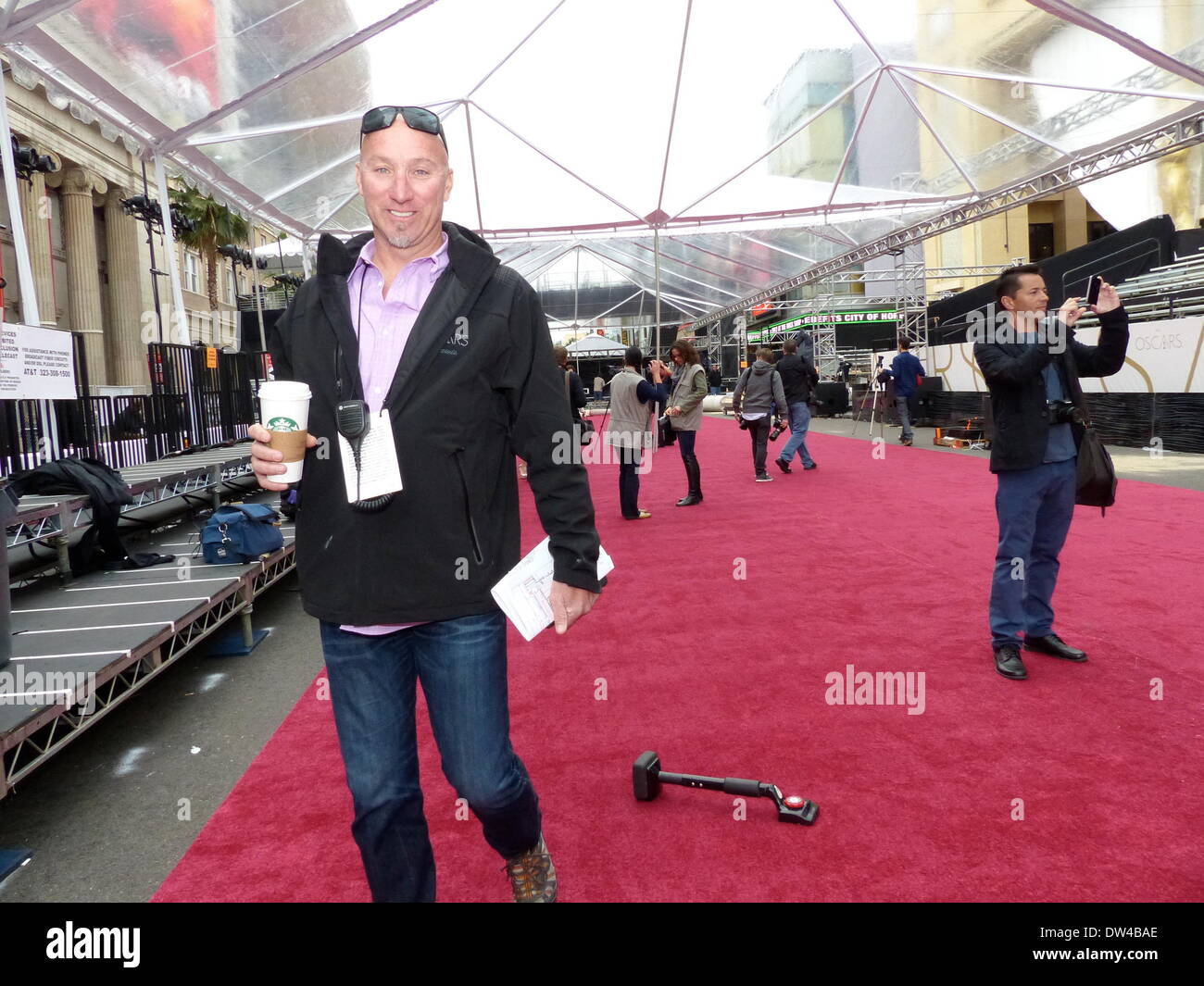 Producer of the pre-show Joe Lewis as the red carpet is being installed ...