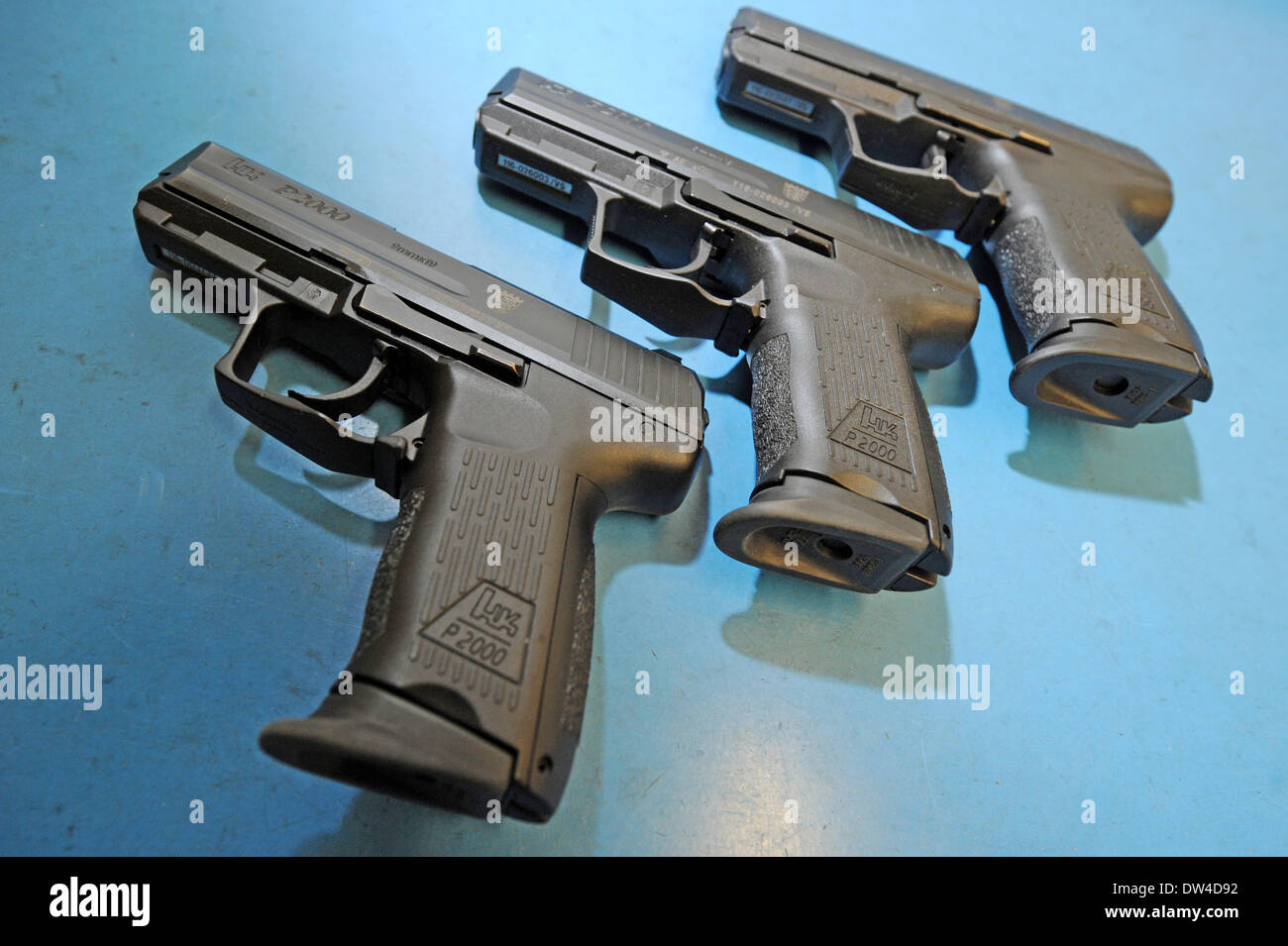 A photo dated 15 March 2010 shows three police pistols P2000 made by ...