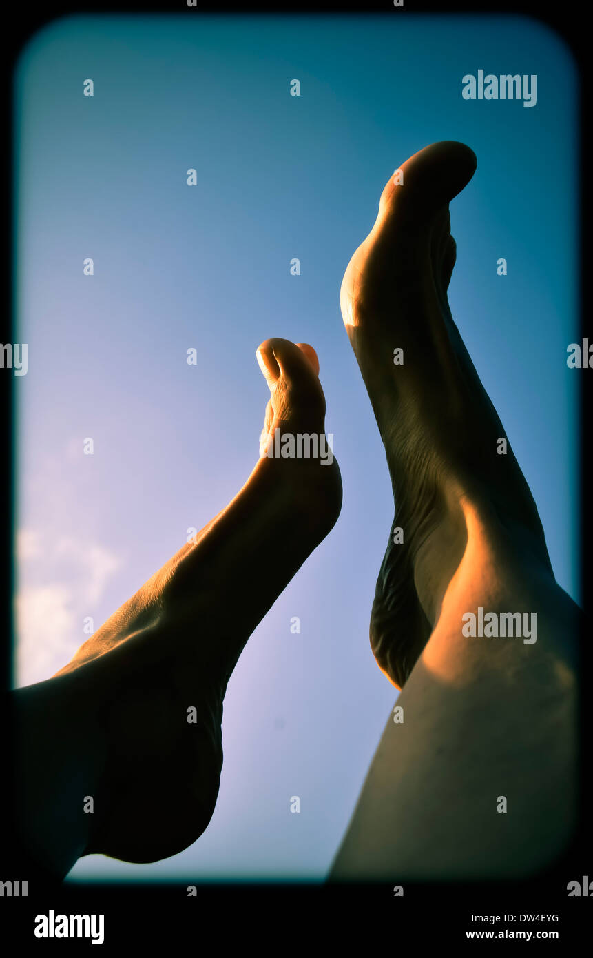 Woman's feet in the sky Stock Photo - Alamy