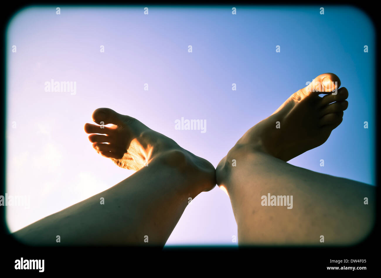 Woman's feet in the sky Stock Photo - Alamy